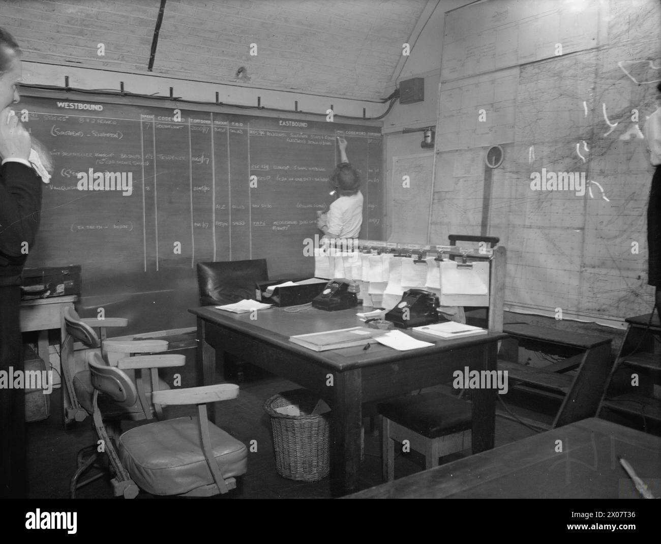 NAVAL PLOTTING AT DOVER. 17 APRIL 1945. - A scene in one of the ...