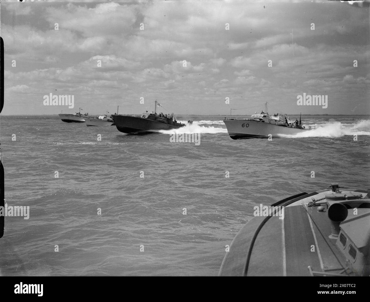 A line of Royal Navy Motor Gun Boats, including MGB 60, 62, and 65 ...