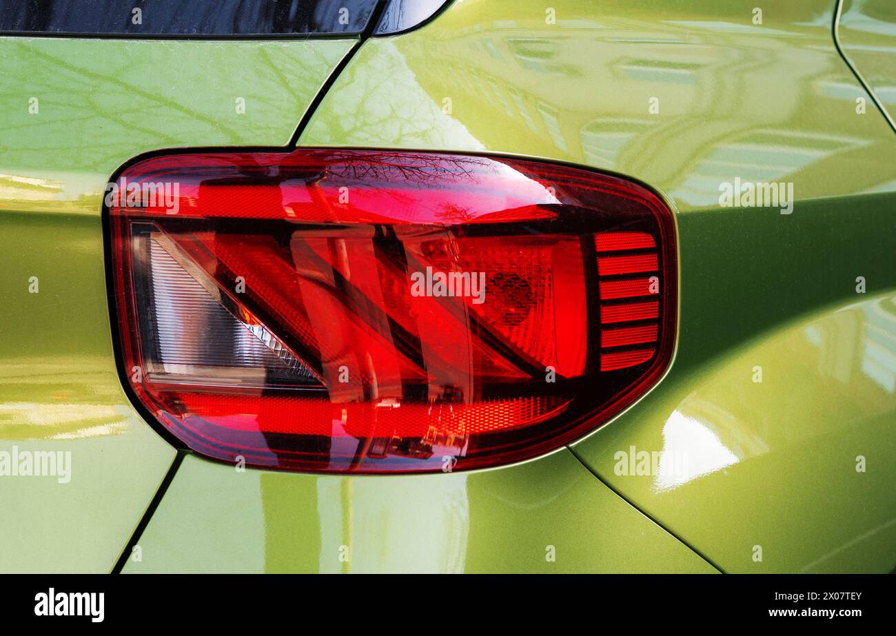 Rear running lights of Hyundai Venue green apple car close-up. Exterior ...