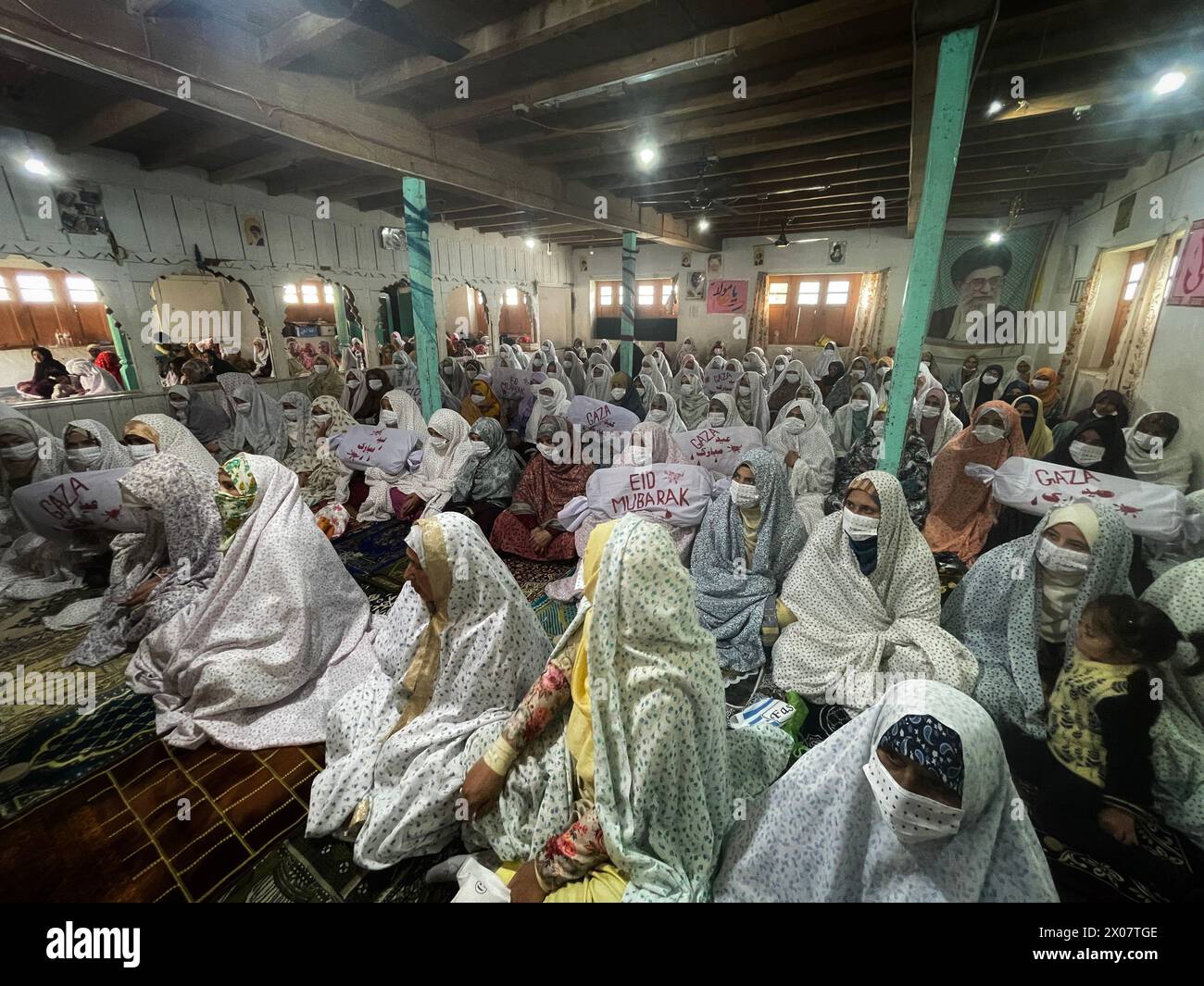 Budgam, India. 10th Apr, 2024. Kashmiri Muslim women holding white ...