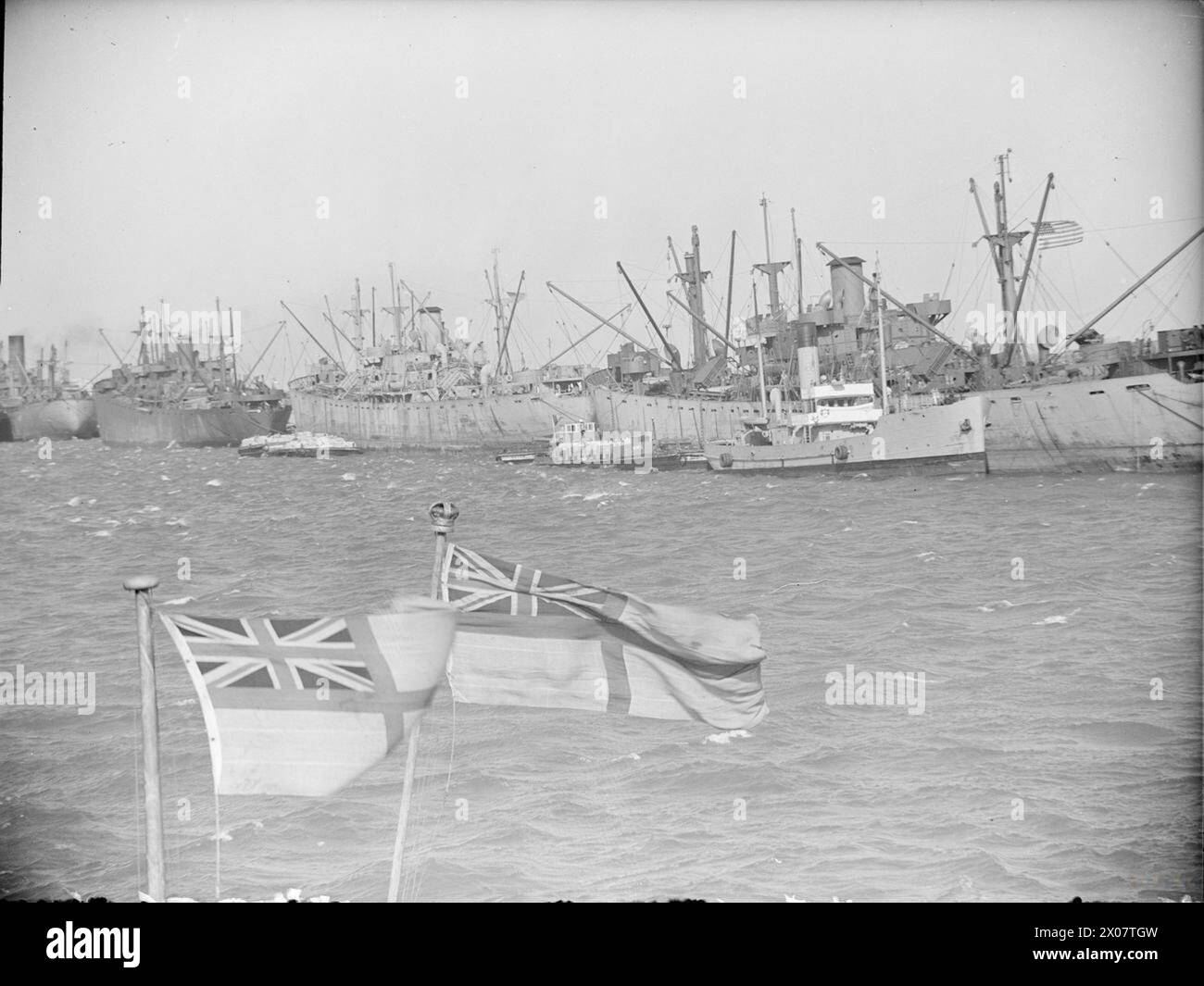 A photograph showing a convoy of American and British Liberty ships ...