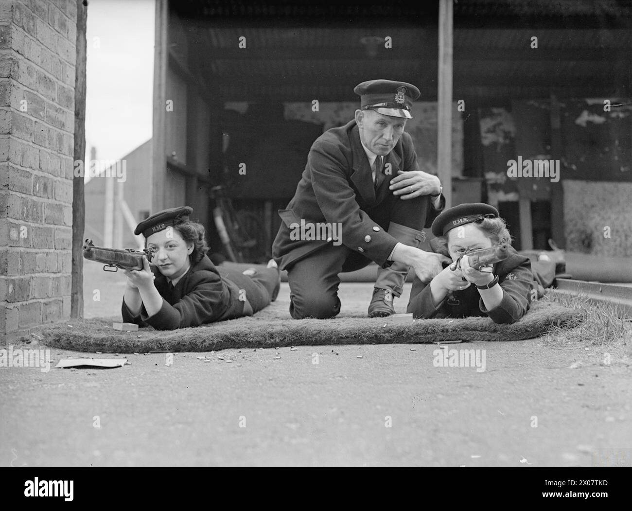 WRENS TAUGHT TO SHOOT WITH RIFLES AND REVOLVERS. 25 MAY 1944, ROSYTH ...