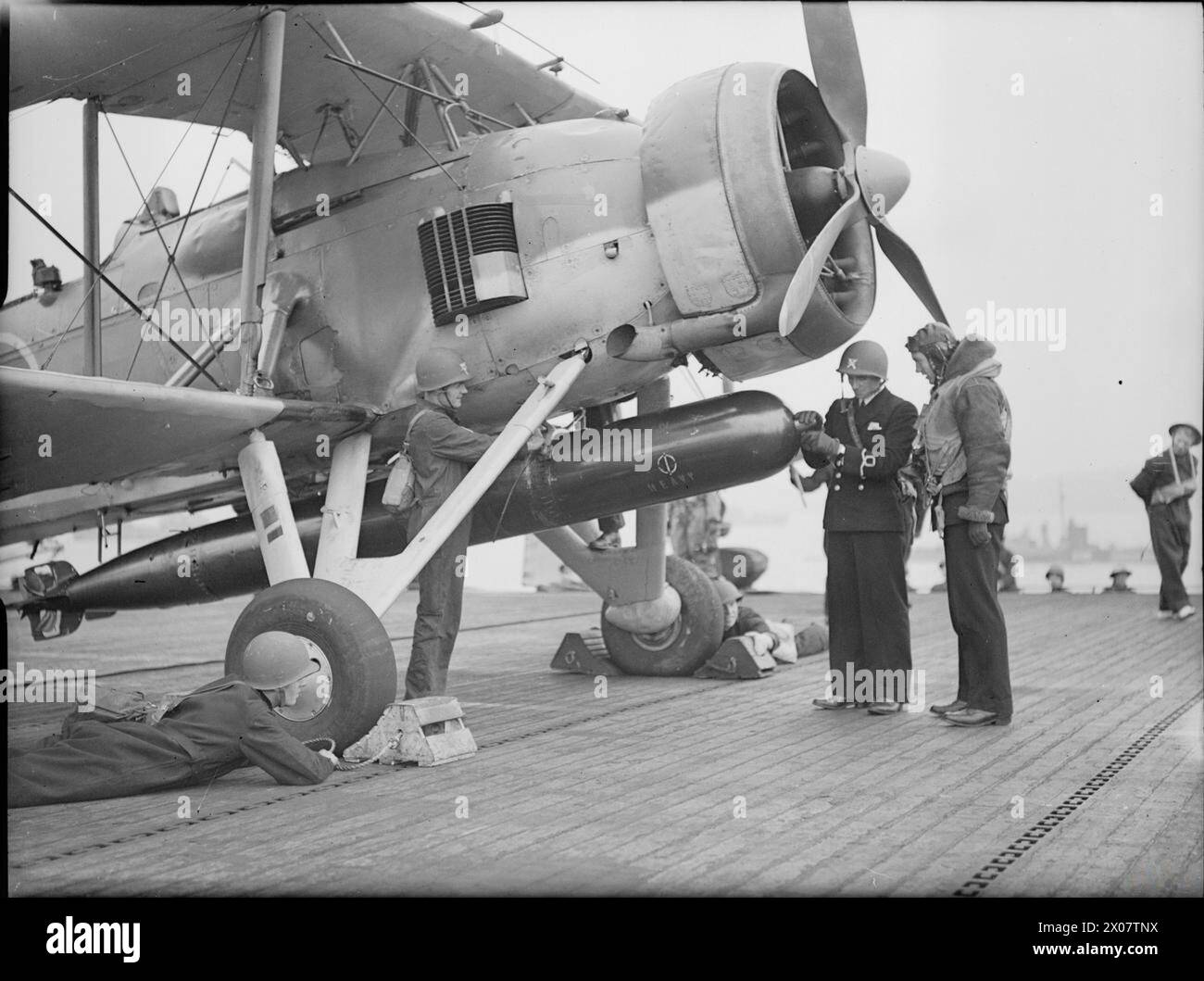 Crew of No 835 Squadron Fleet Air Arm prepare a Fairey Swordfish ...