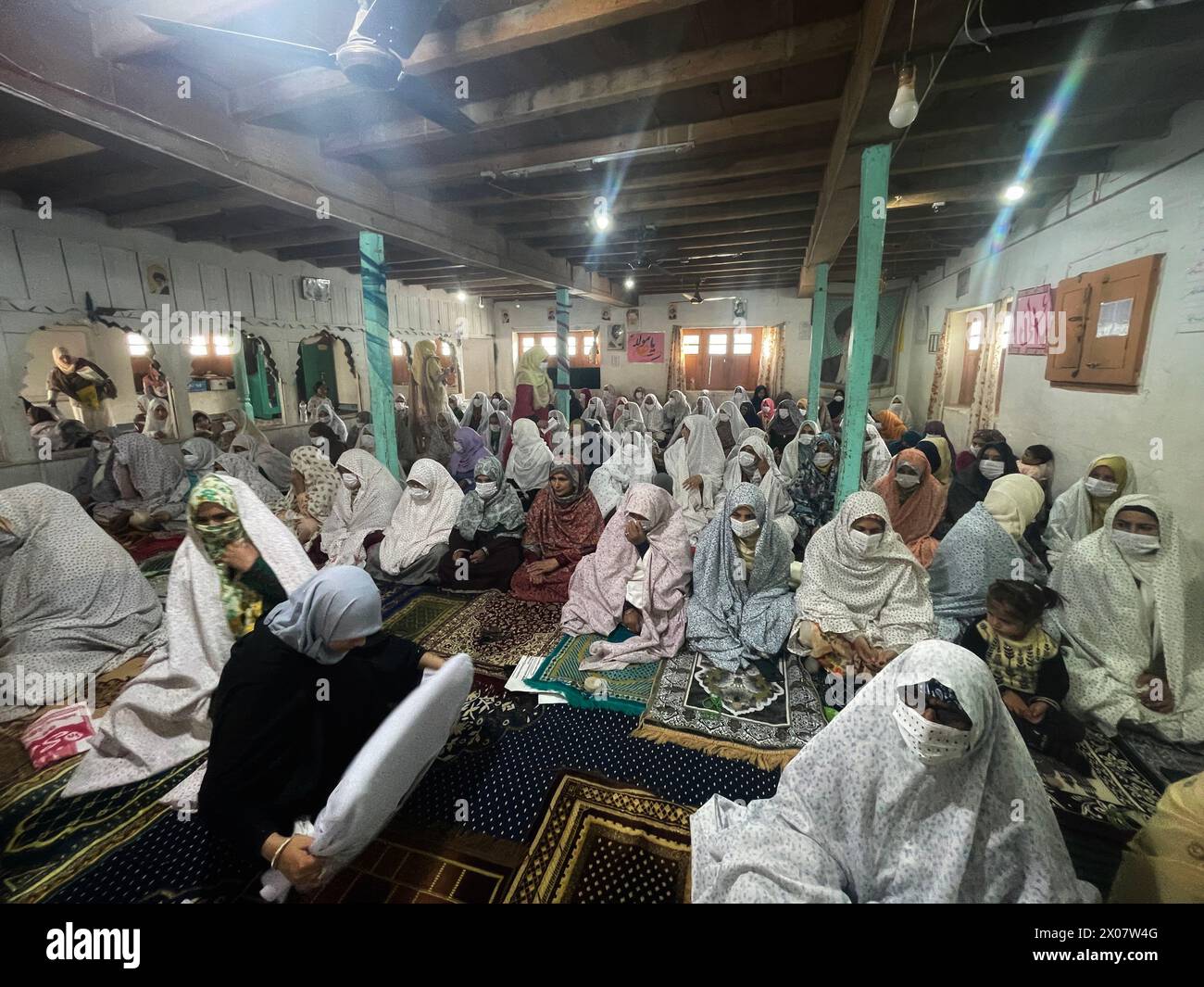 Budgam, India. 10th Apr, 2024. Kashmiri Muslim women holding white ...