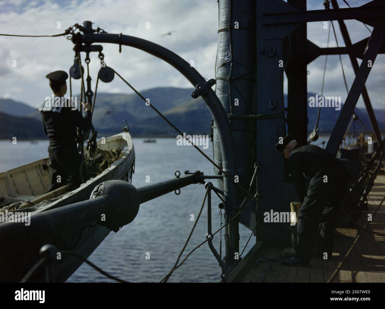 ON BOARD THE SUBMARINE DEPOT SHIP HMS FORTH, HOLY LOCH, SCOTLAND, 1942 ...