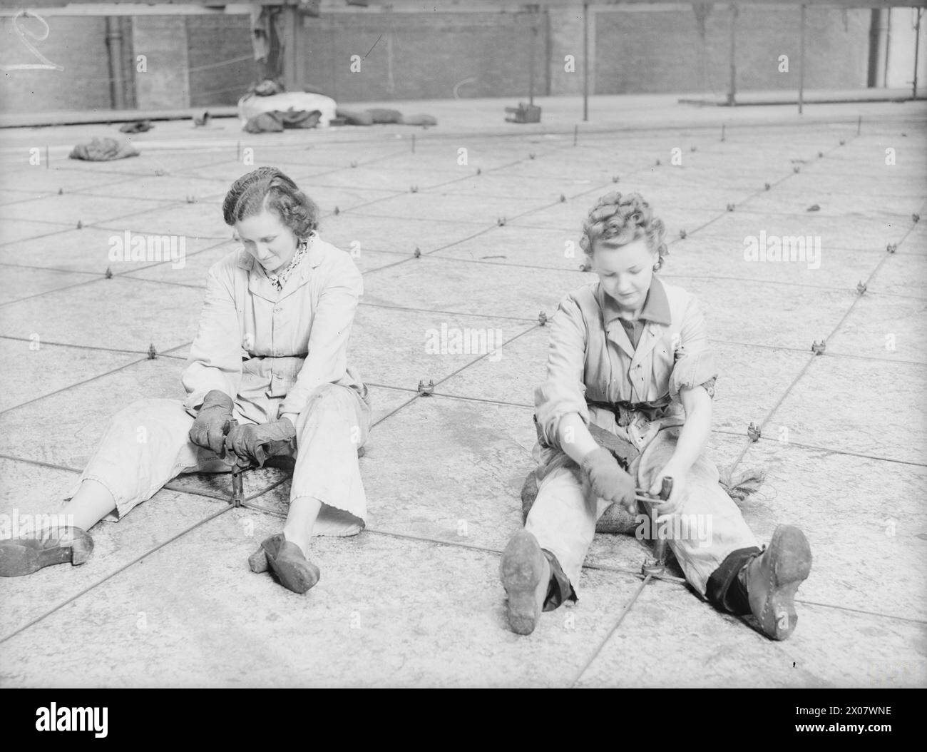 Women of the Royal Navy produce boom defence nets in Southampton on 13 ...