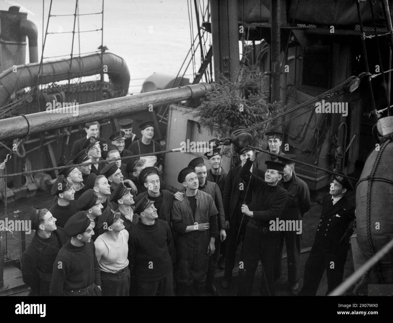 CHRISTMAS WITH THE TRAWLERS. 21 DECEMBER 1943, HARWICH. MEMBERS OF THE ...