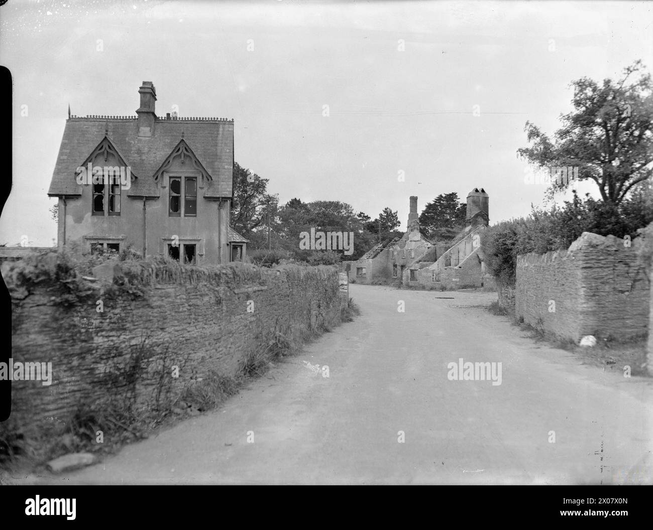 In September 1944, the village of Strete in Devon shows damage to ...