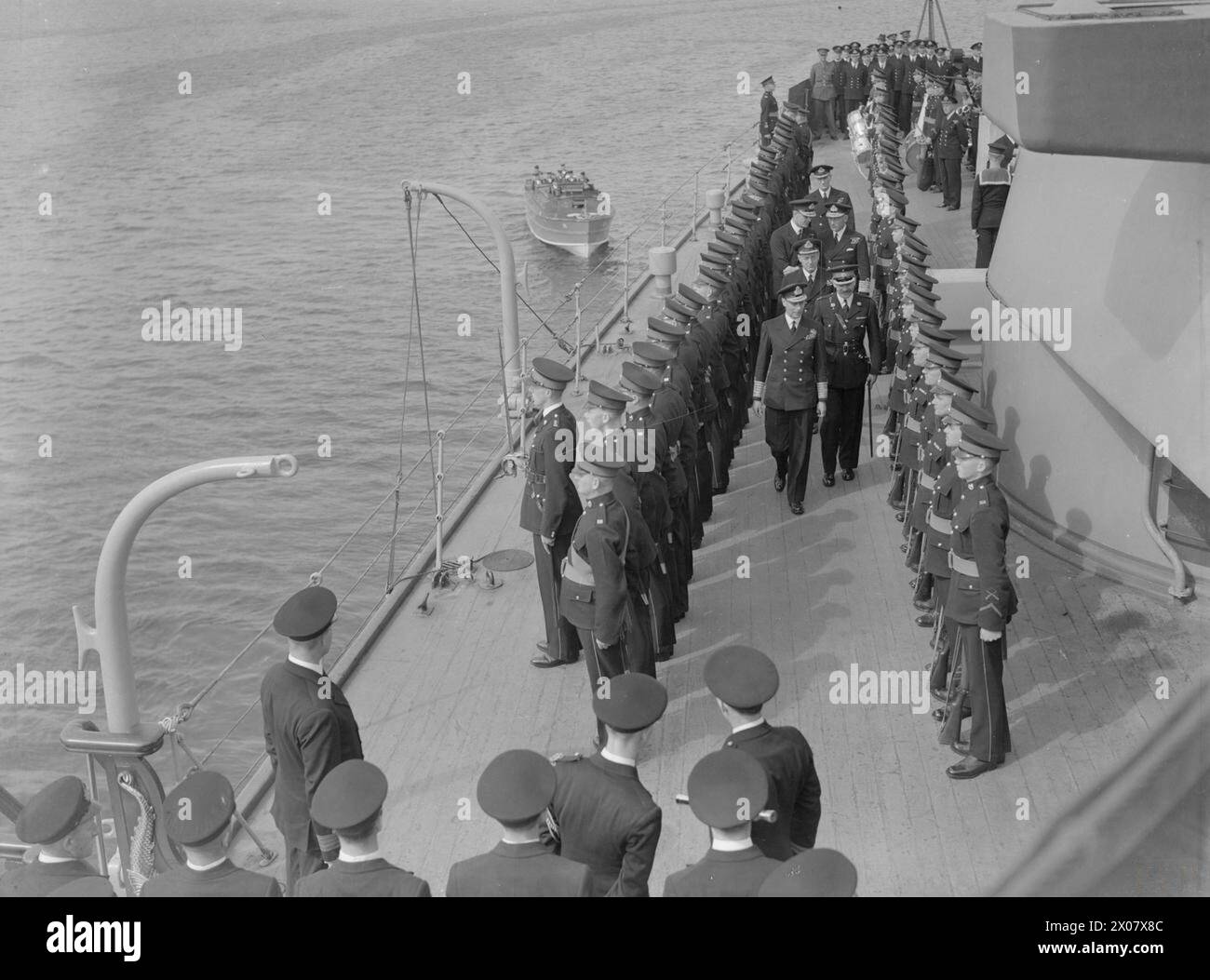 HM The King inspects the Royal Marines' guard on board HMS Suffolk ...