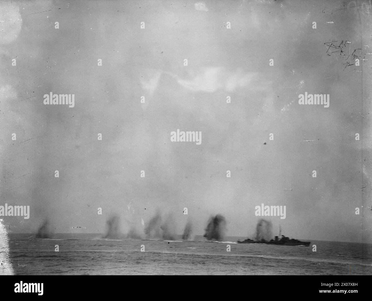 HMS Jackal is depicted avoiding a bomb attack off Crete in May 1941 ...