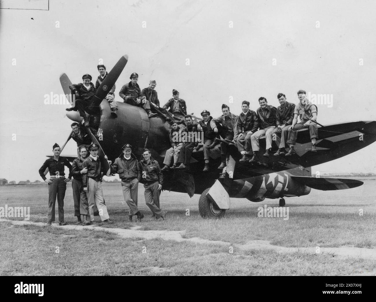 Pilots of the 56th Fighter Group sit on a P-47 Thunderbolt at Boxted ...