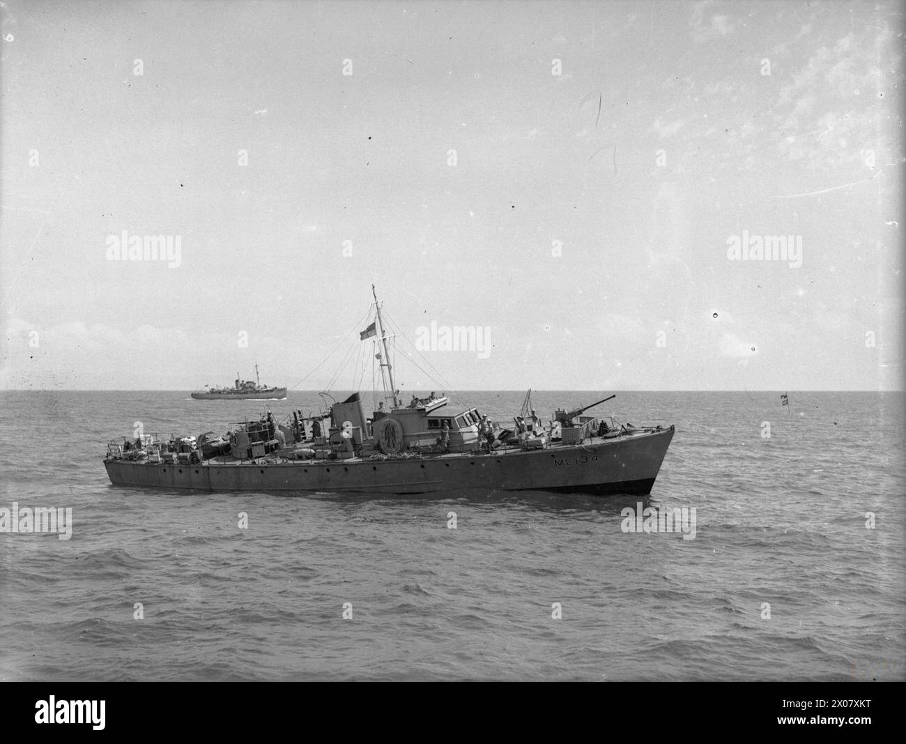 THE ROYAL NAVY DURING THE SECOND WORLD WAR - ML 134 is brought about to chase a floating mine ...