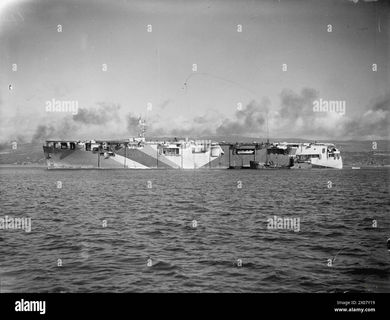 HMS Pretoria Castle, formerly a luxury liner, served as an auxiliary ...