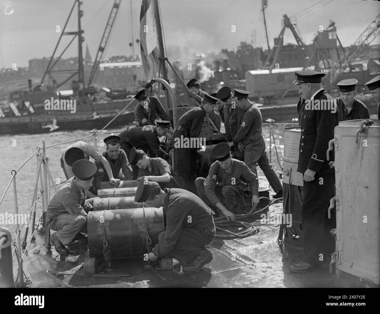 ESKIMO BACK AFTER GETTING A U-BOAT. 27 JUNE 1944, PLYMOUTH. OFFICERS ...