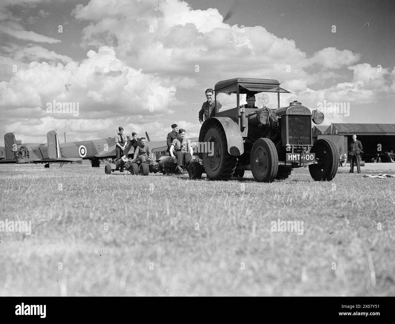 ROYAL AIR FORCE 1939-1945: BOMBER COMMAND - A Fordson tractor pulls a ...