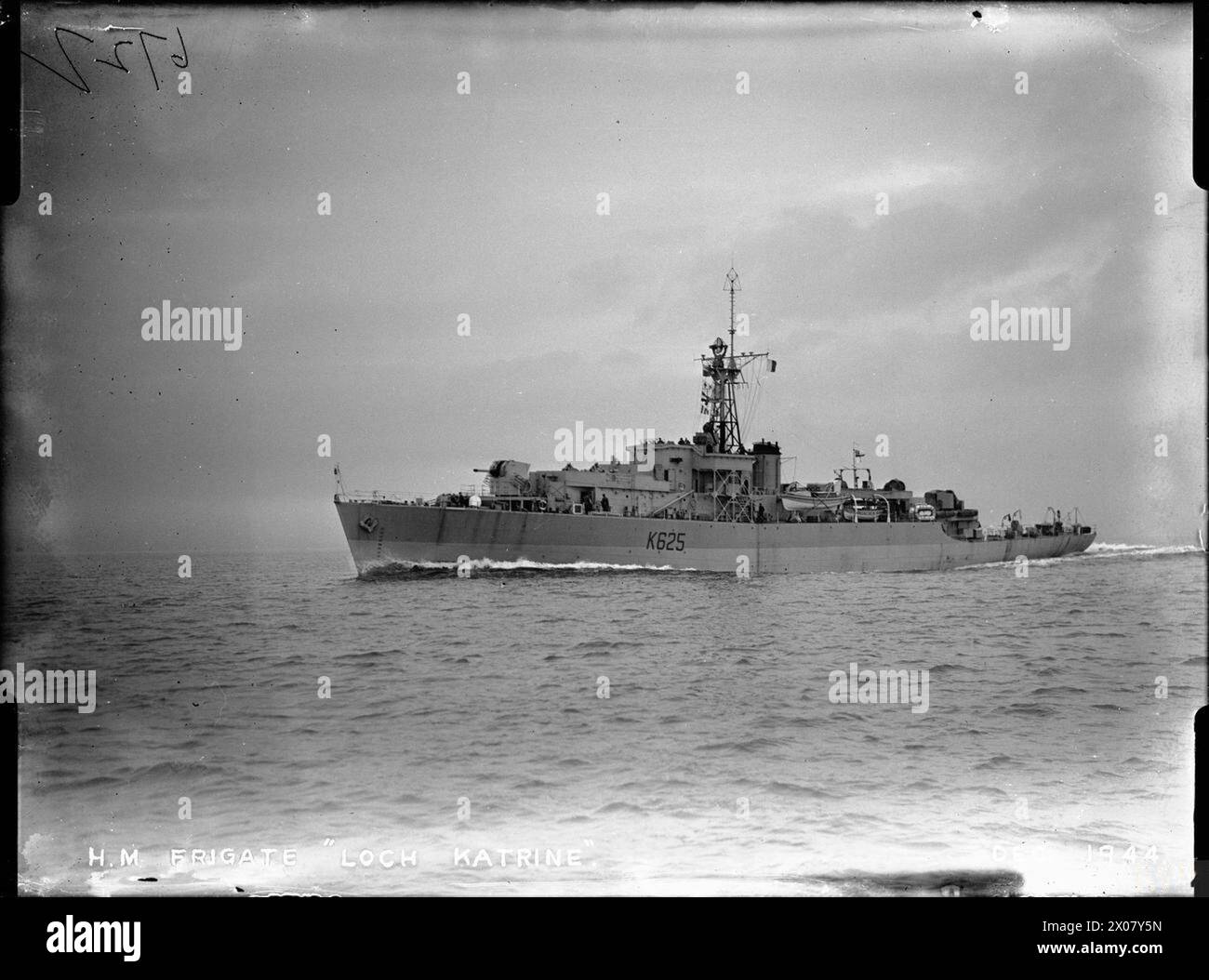 HMS Loch Katrine is underway in Loch Katrine with crew visible on deck ...