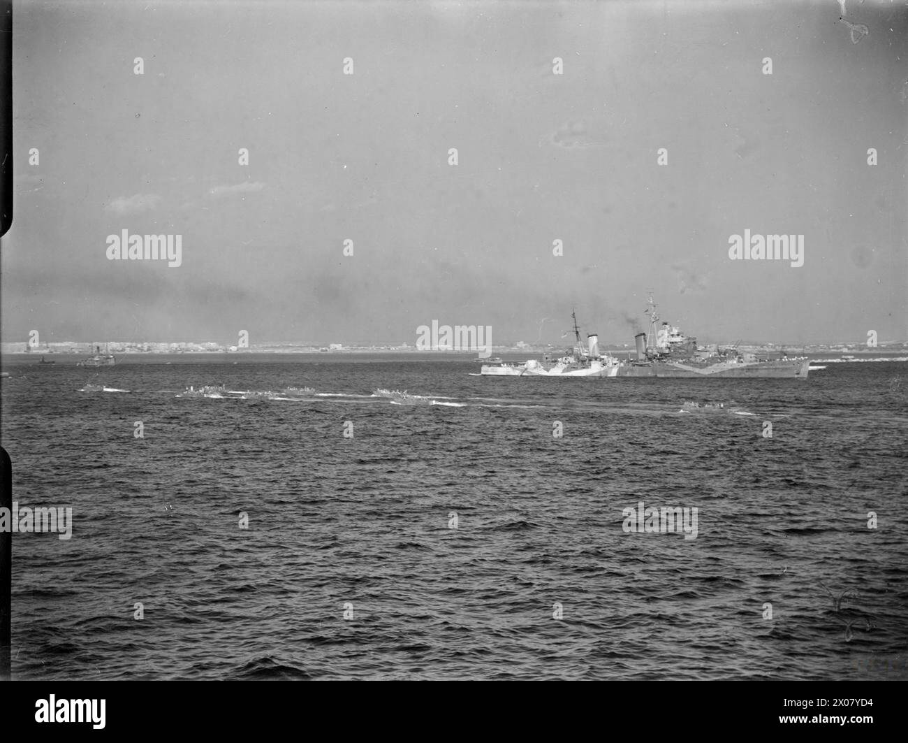 In 1943, during the Italian landings, multiple landing craft carrying ...
