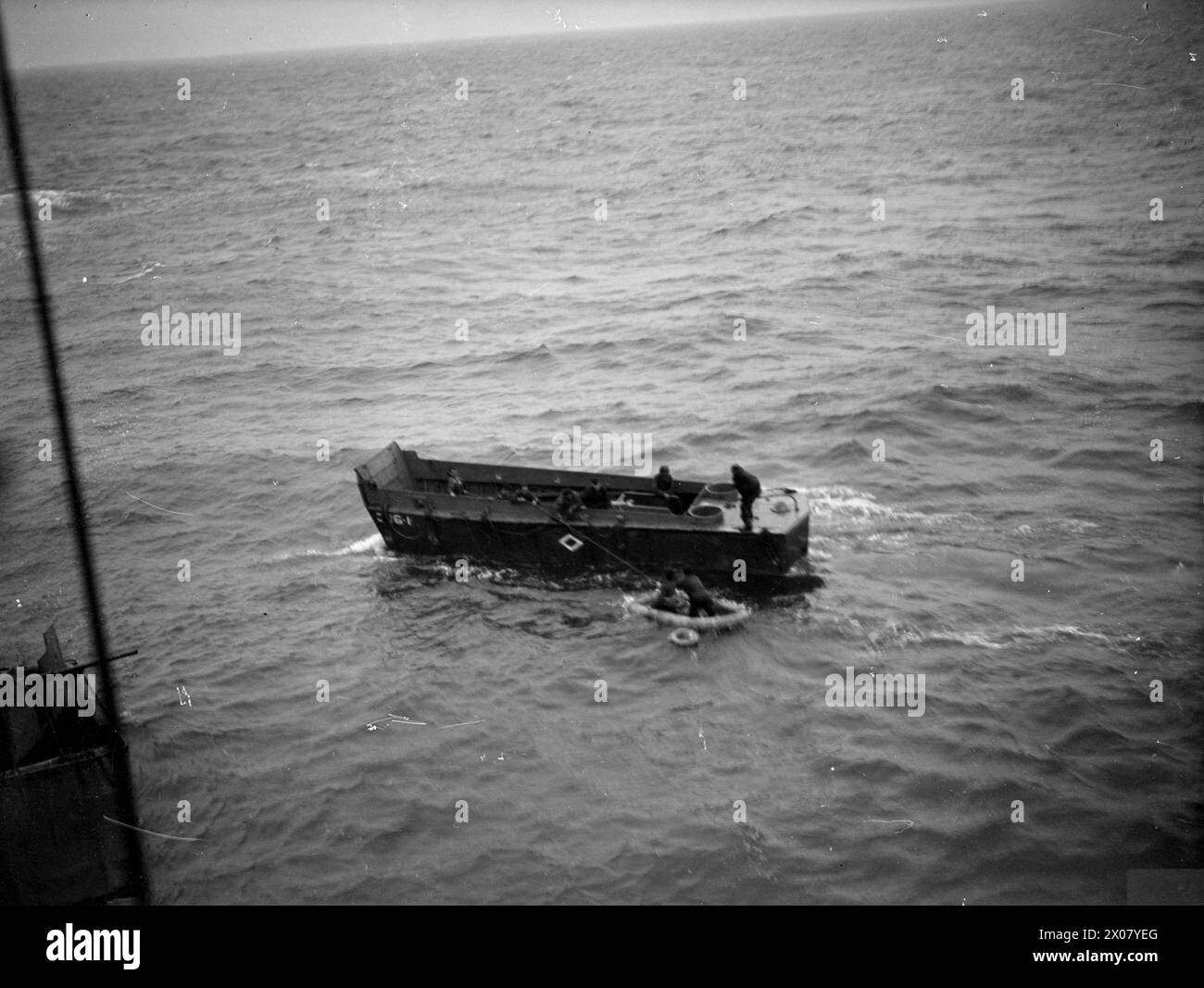 HMS Beagle, a Royal Navy destroyer, rescued survivors from two American ...