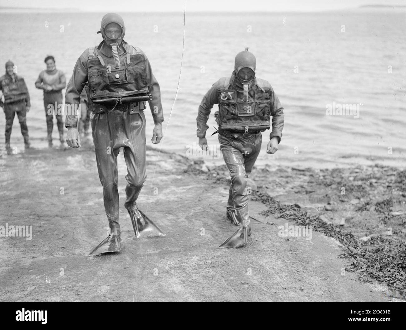 Frogmen of the Landing Craft Obstruction Clearance Unit complete ...
