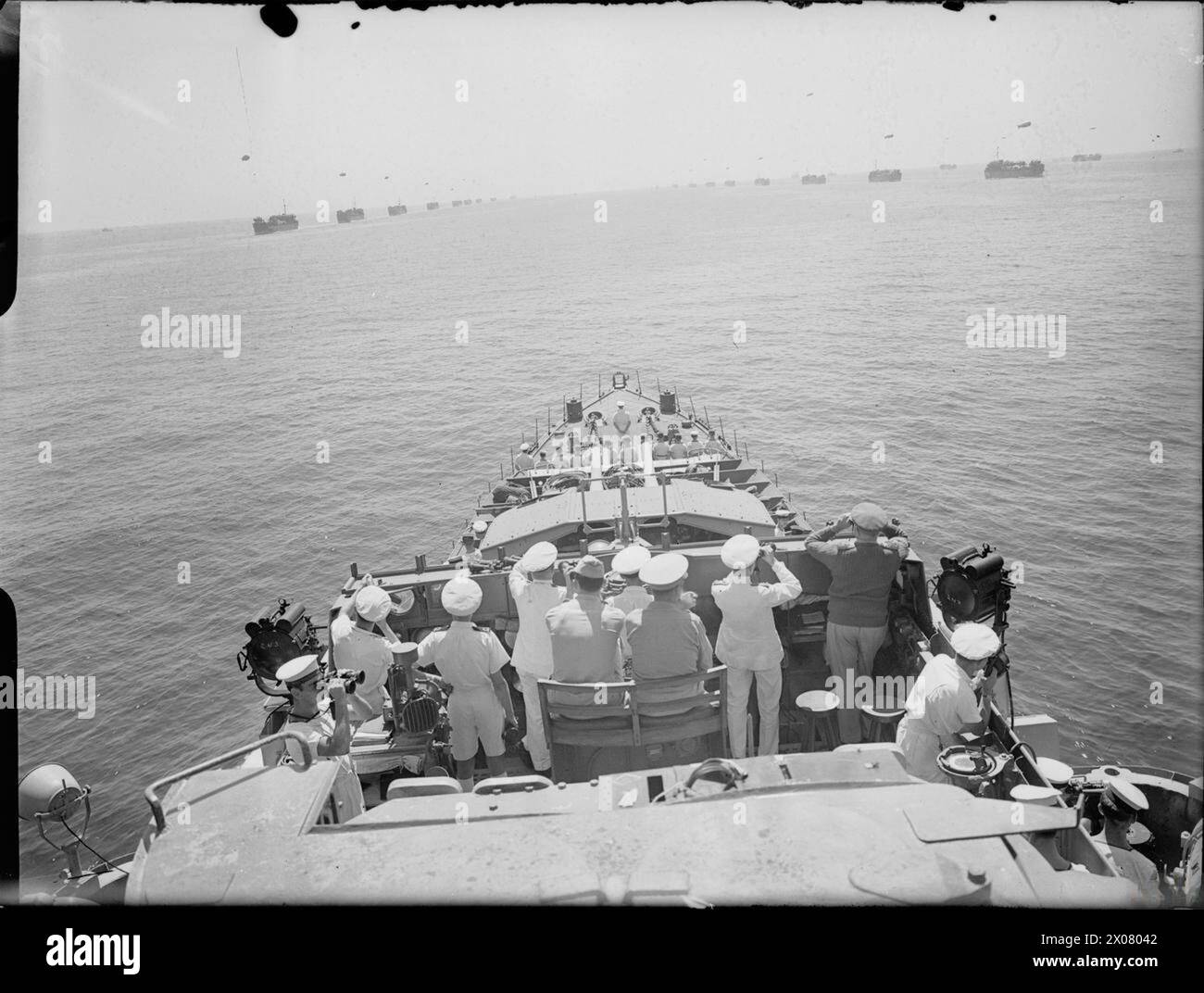 HMS Kimberley moved through landing craft preparing for the southern ...