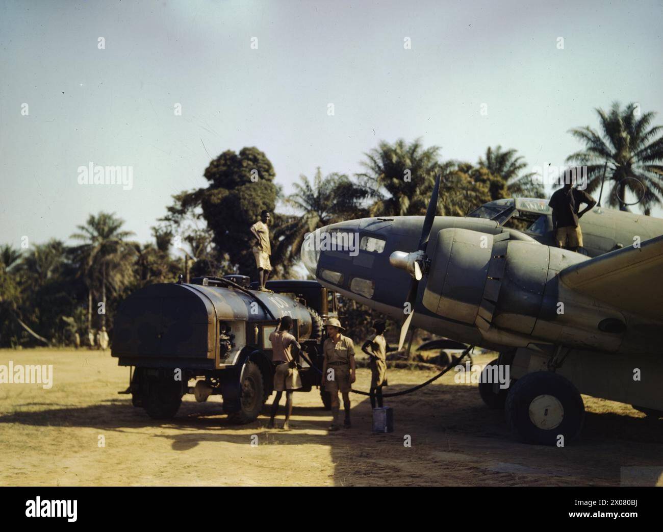 THE ROYAL AIR FORCE IN WEST AFRICA, 1943 - Local workers help to refuel ...