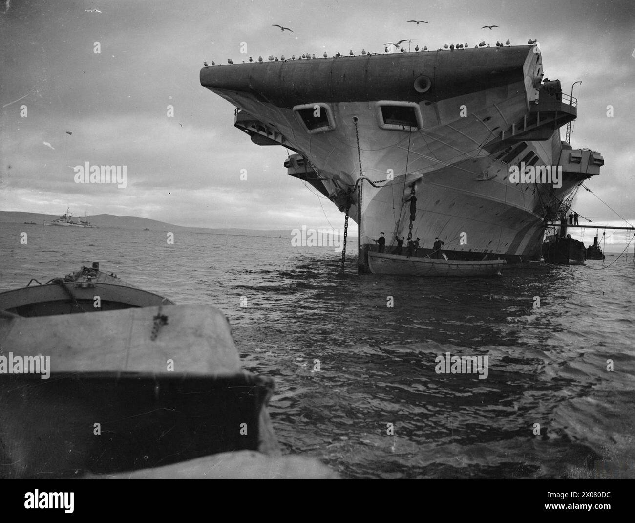 HMS VICTORIOUS AT ANCHOR. 18 DECEMBER 1941, SCAPA. - The painting party ...