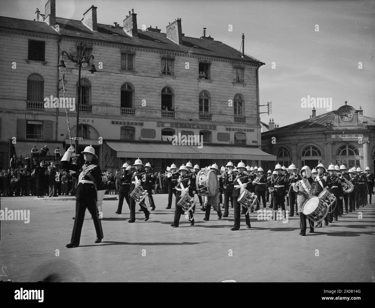 In May 1945, the Royal Marines Chatham Division band performed 'beating ...
