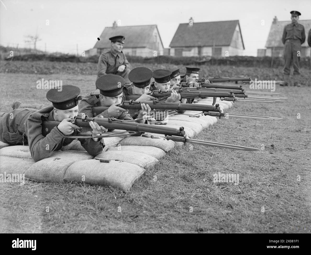 In 1940, Royal Navy sailors at a Devonshire training camp practiced ...