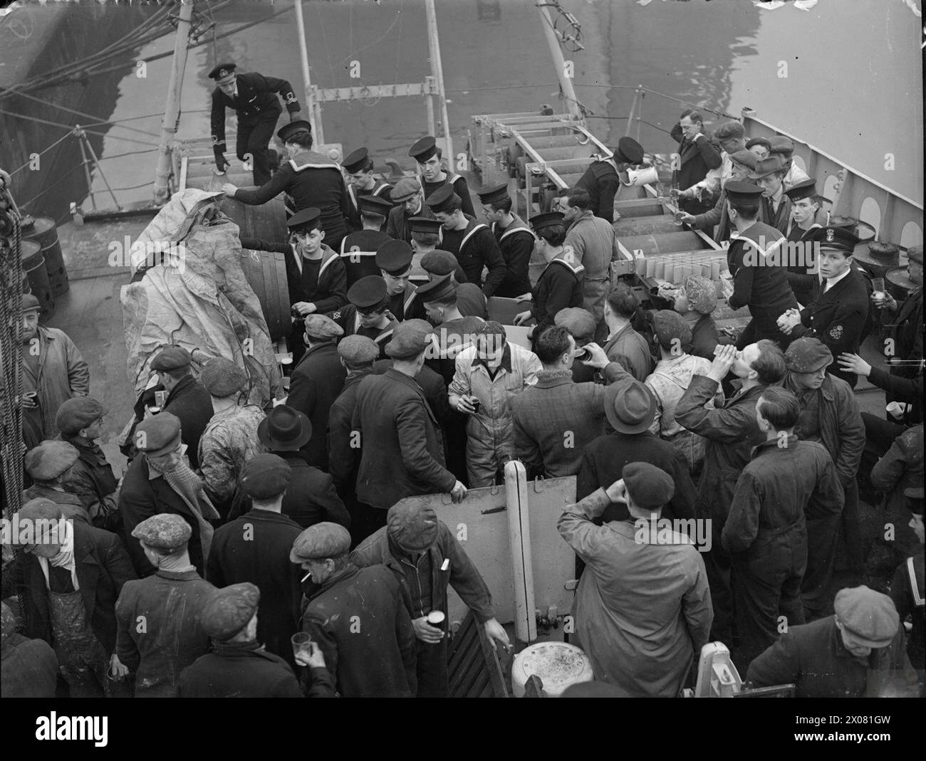 On 13 February 1944, the crew of HMS Waveney hosted dockyard workers on ...