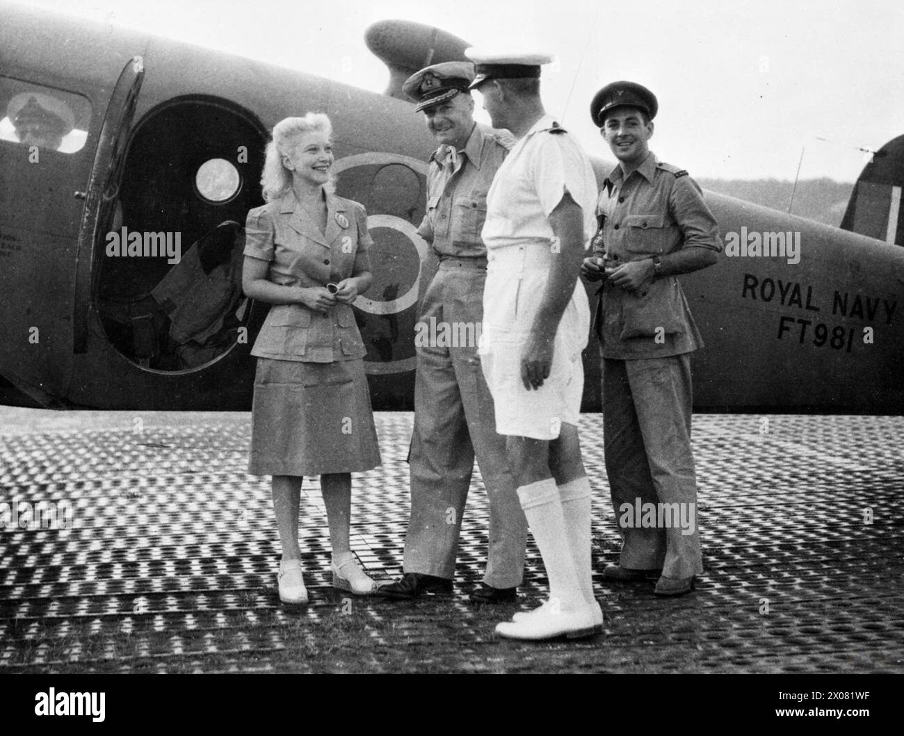 A photograph of Miss Frances Day arriving in Ceylon in May 1945, met by ...