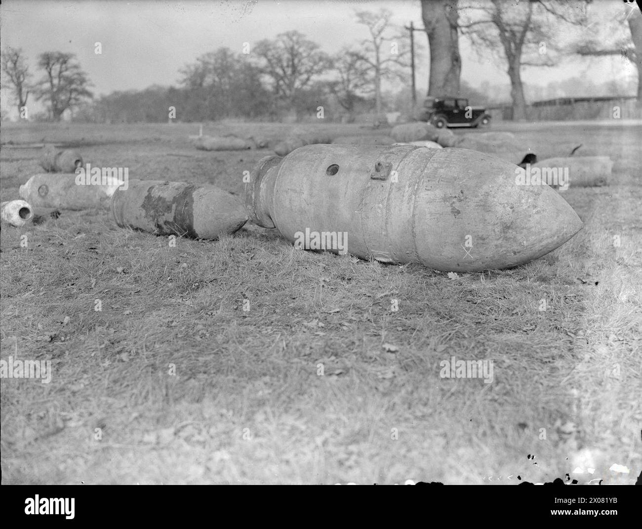 Naval personnel handled and inspected bombs of various sizes as part of ...