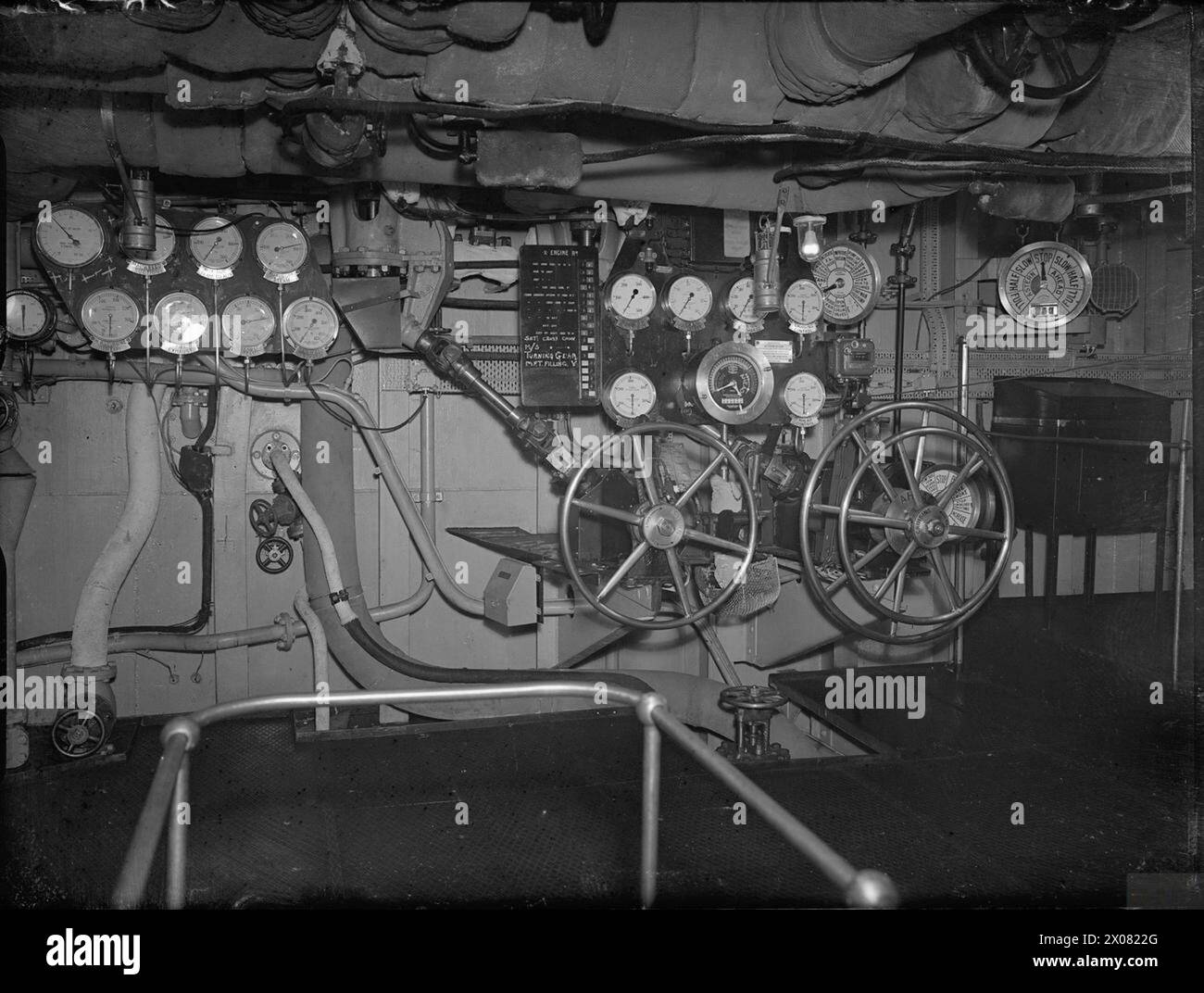 On 22 February 1944 at Rosyth, HMS Indefatigable's engine room starting ...