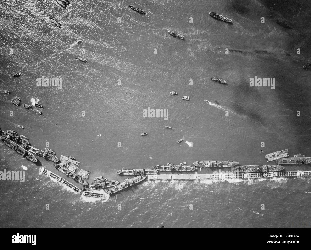THE MULBERRY HARBOUR - An aerial view of a line of blockships which ...