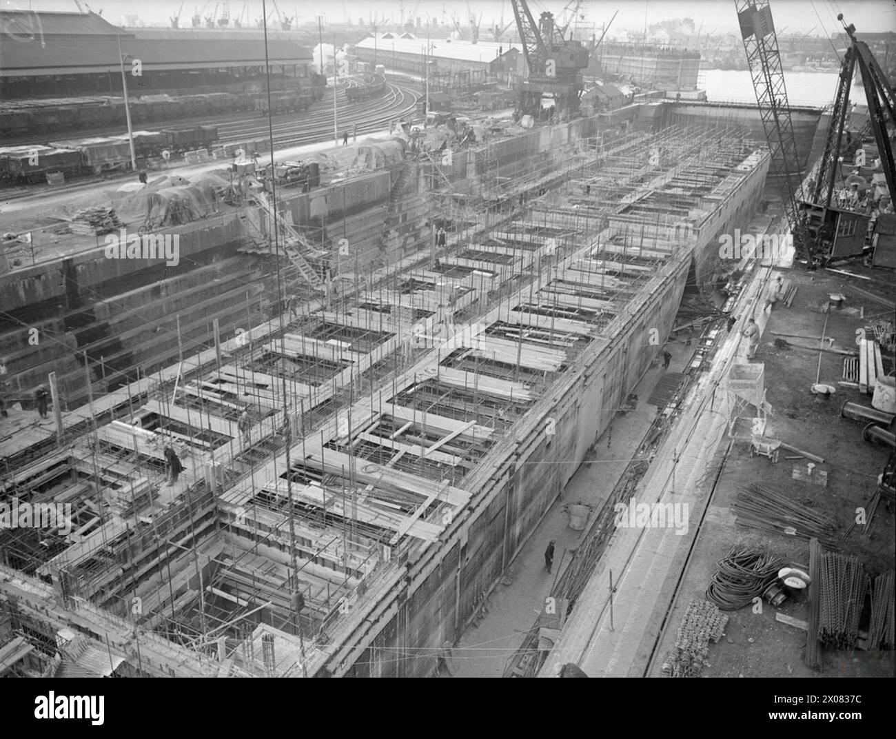 In April 1944, prefabricated Mulberry Harbours, including concrete ...