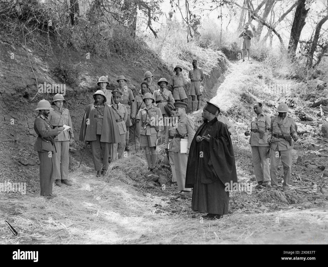 NEGUS UNFURLS STANDARD IN ABYSSINIA - Wearing the uniform of a Field ...