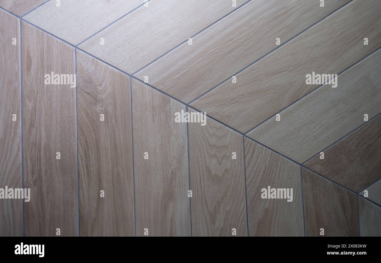 Oak texture of floor with tiles imitating parquet Stock Photo - Alamy