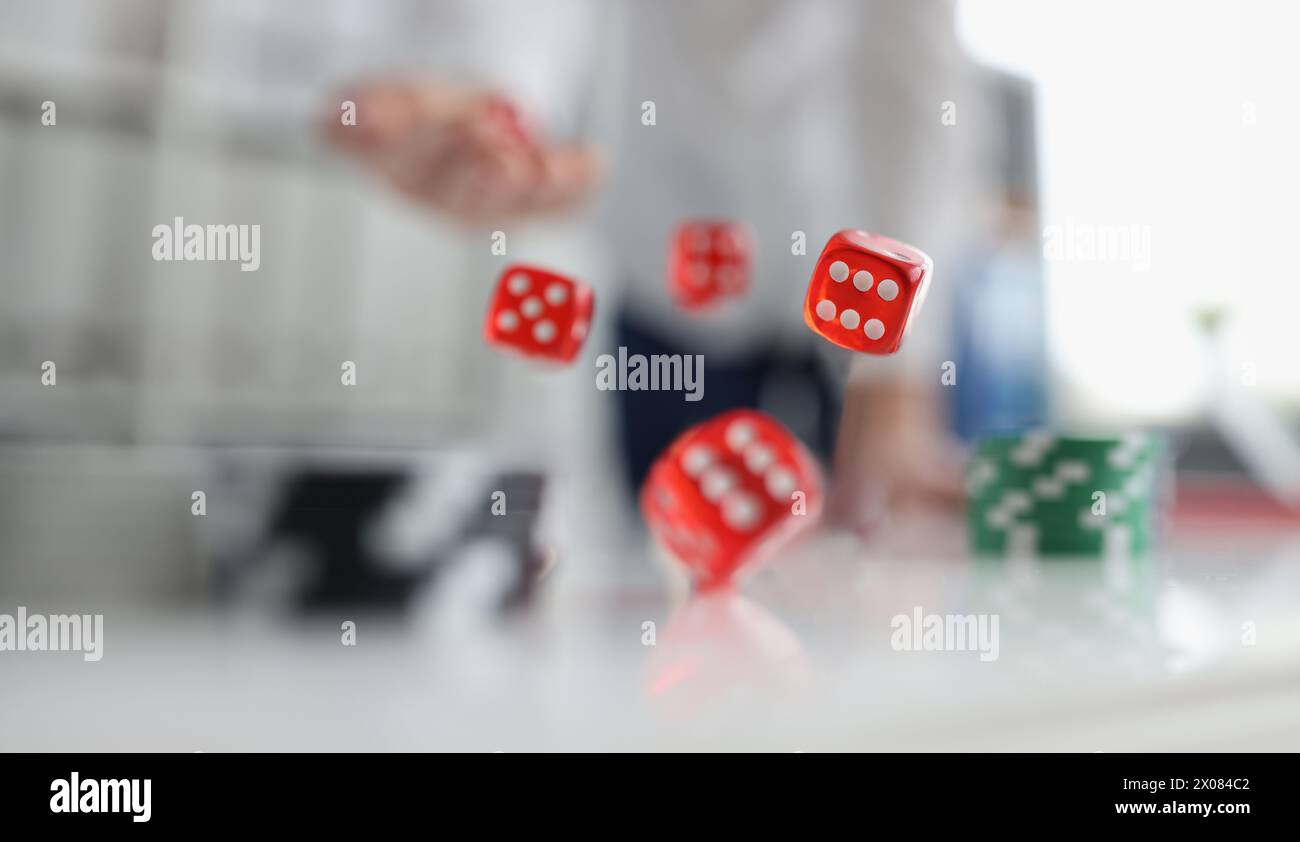 Closeup person throwing dice hi-res stock photography and images - Alamy