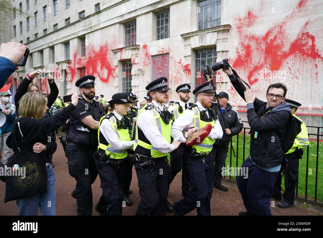 Youth Demand and Palestine action cover the Ministry of Defence in weed ...