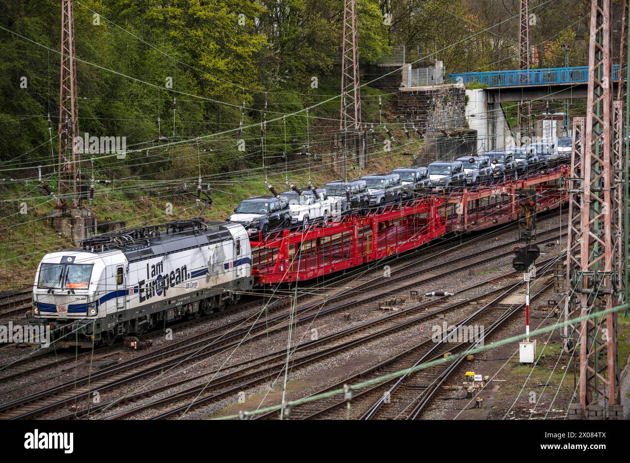 Freight train, car train with Landrover new cars on the freight train ...