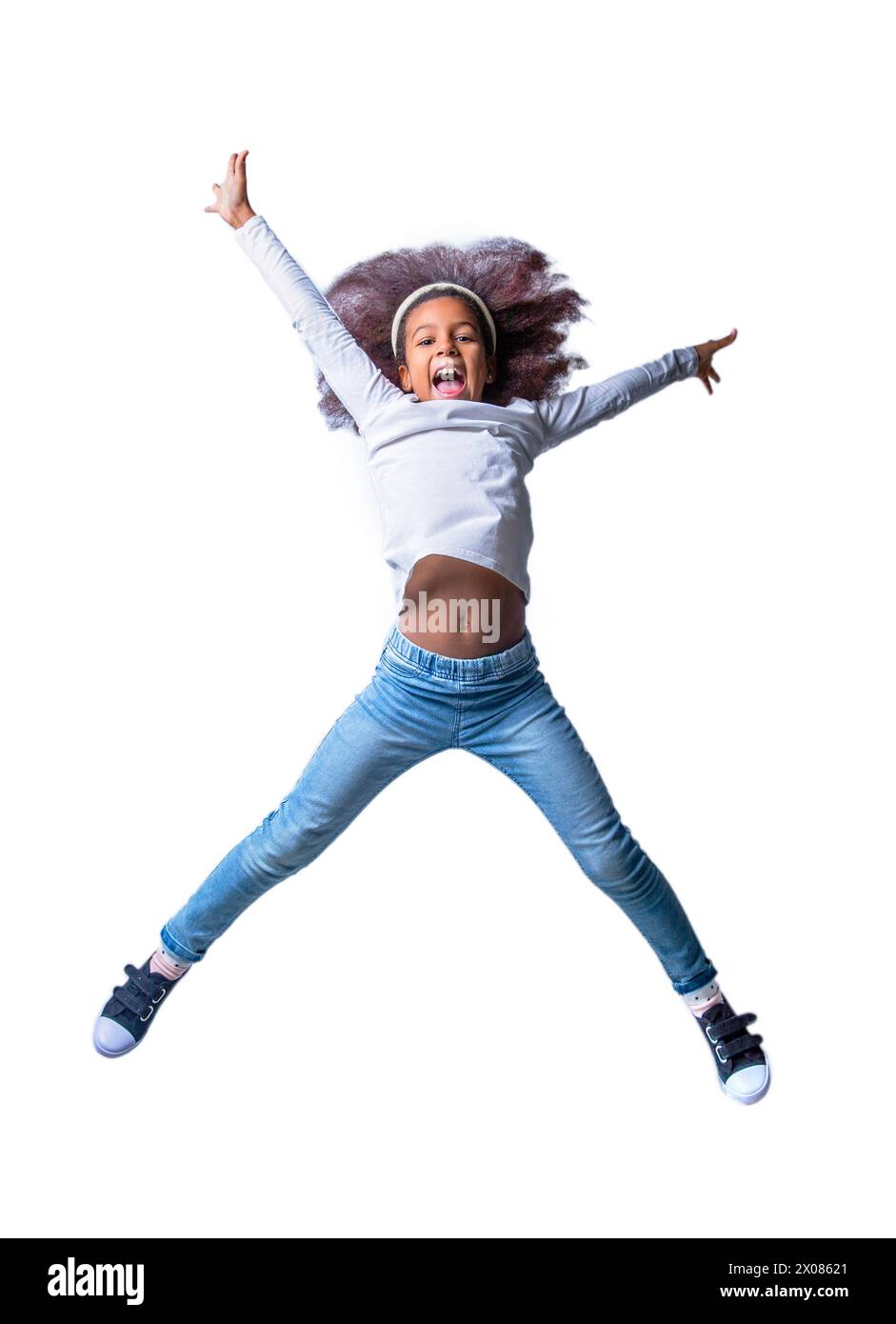 Bright picture of happy jumping teenage girl. Smiling little african ...