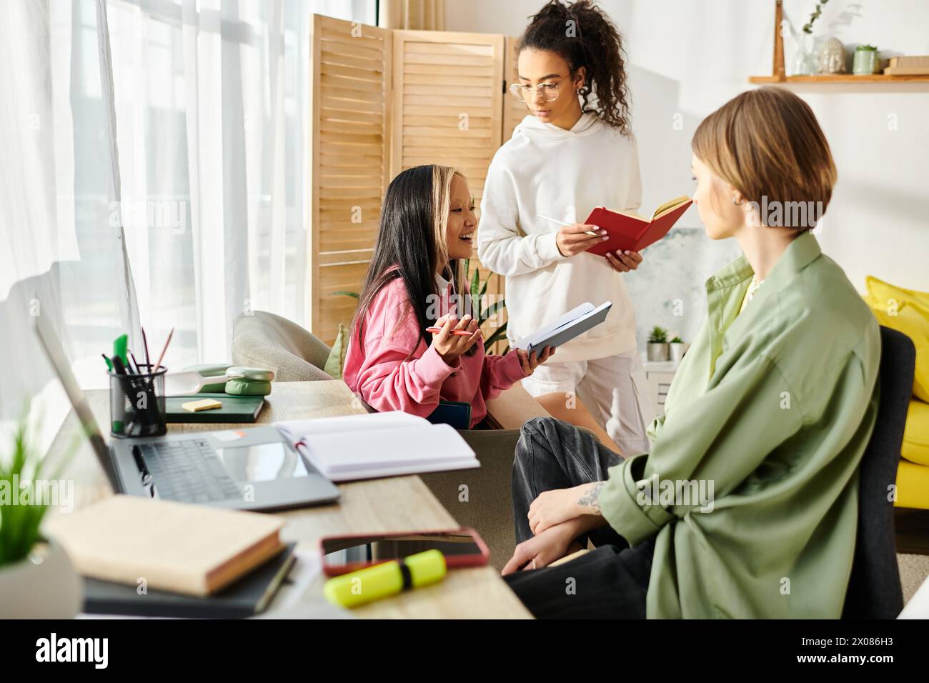 A diverse group of teenage girls of different ethnicities and ...