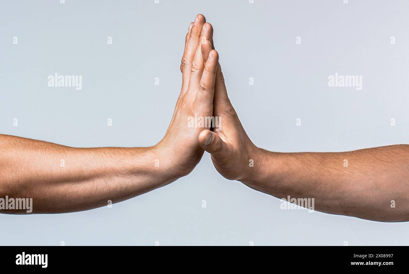 Two hands gestures. Giving high five. Two hands, male and man. High ...