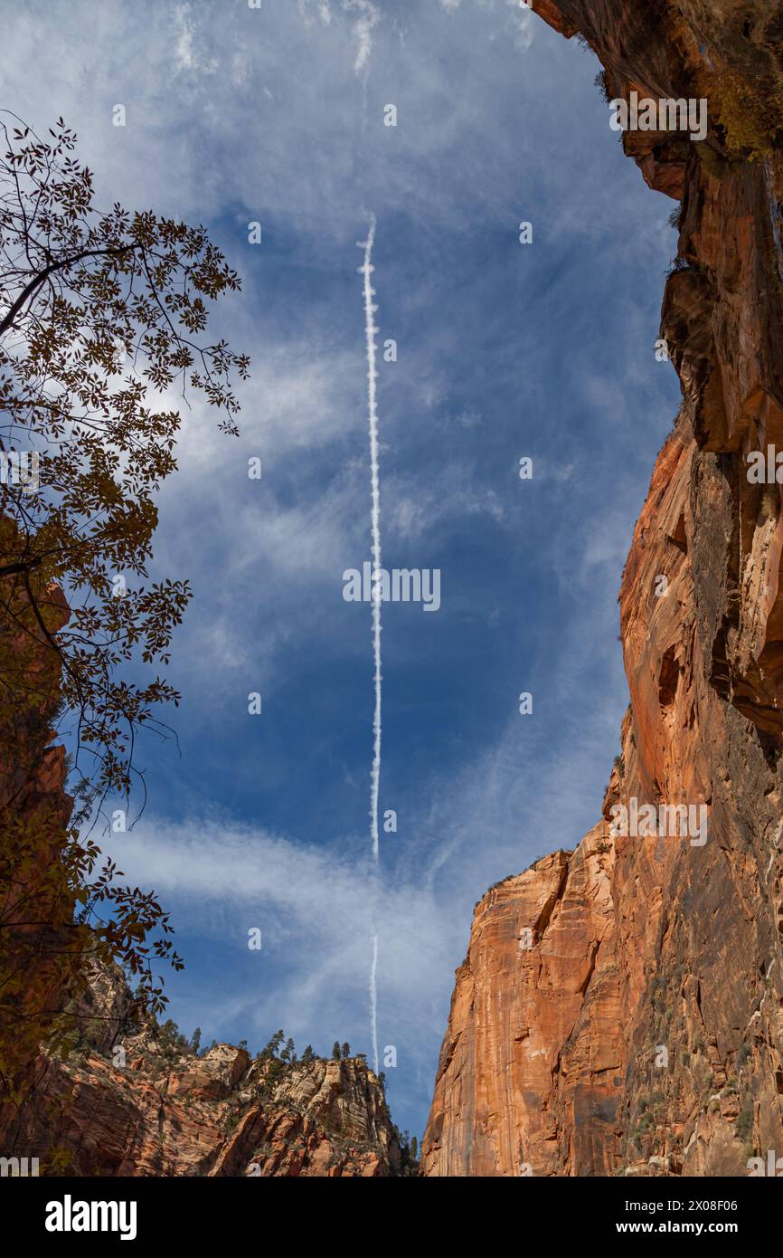 Controversial trails left in the sky by an airplane expand to resemble ...