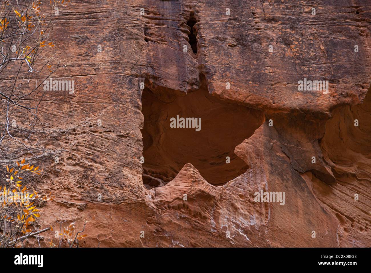 Ancient sandstone eroded by time and weather to create an arrow shaped ...
