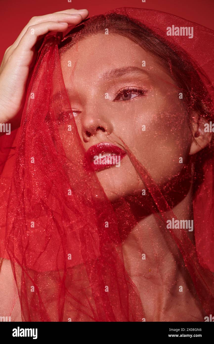 A young woman exudes classic beauty, her head adorned with a striking ...