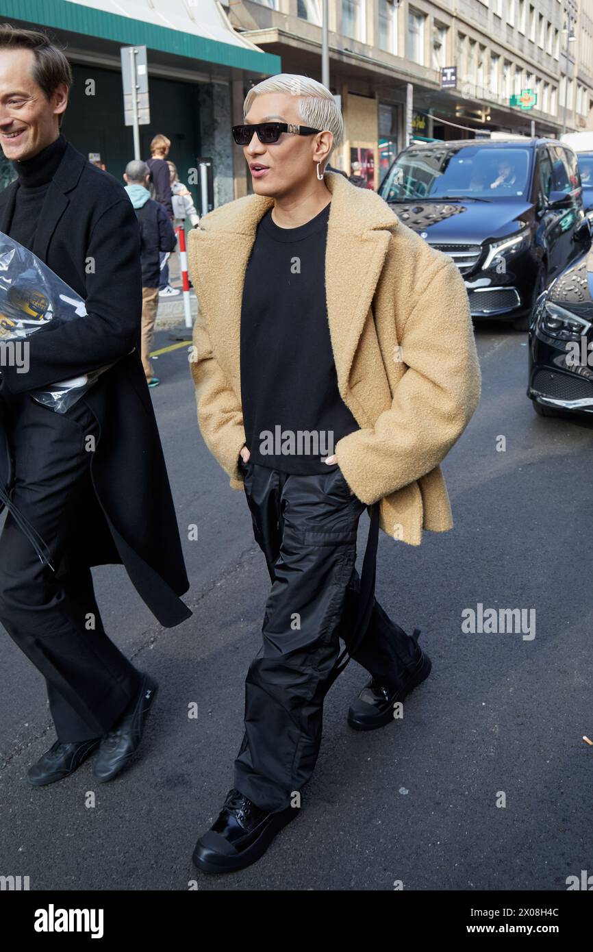 MILAN, ITALY - FEBRUARY 21 , 2024: Brian Boy before Onitsuka Tiger ...