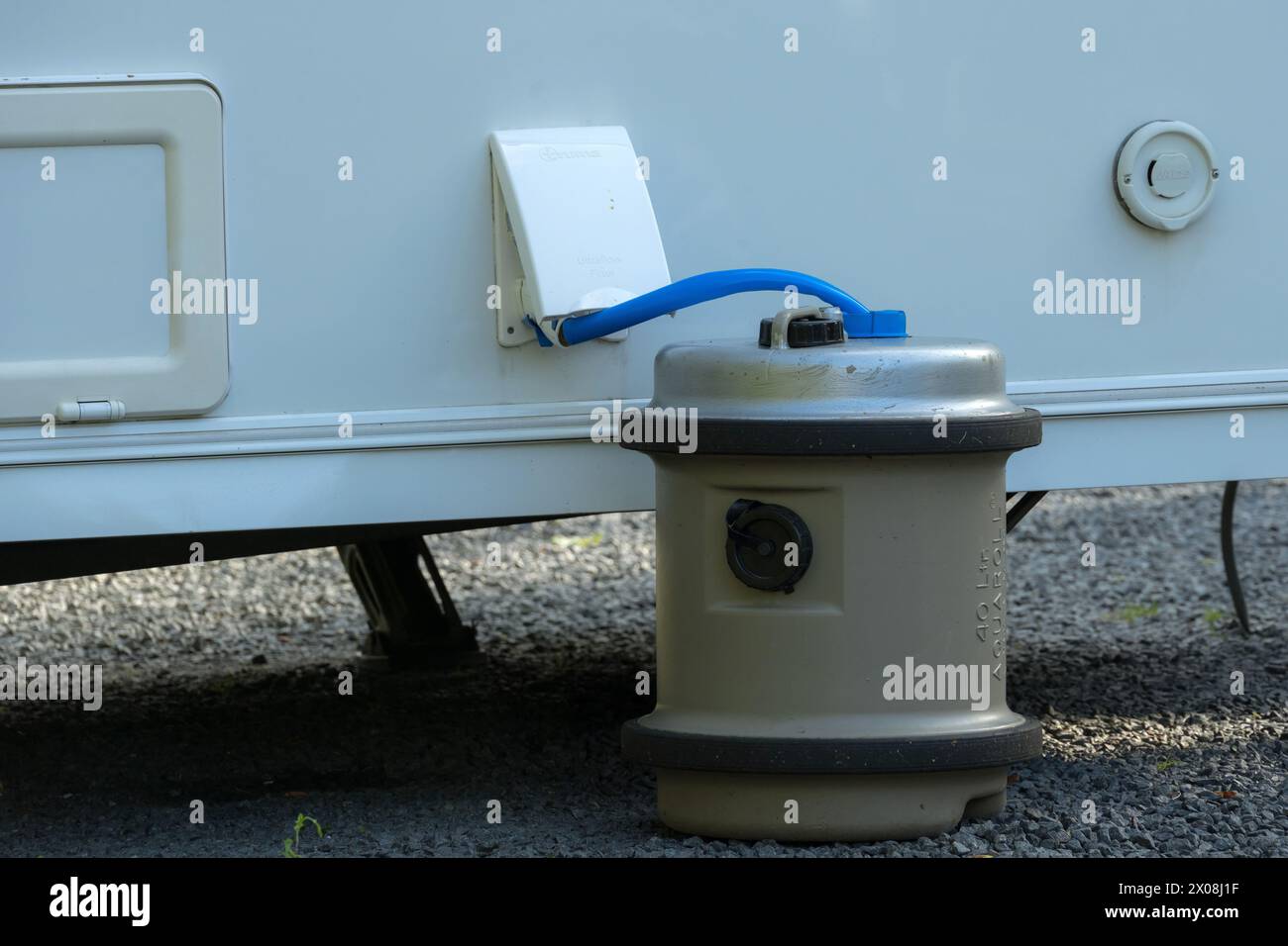 Caravan water tank at pitch site Stock Photo - Alamy
