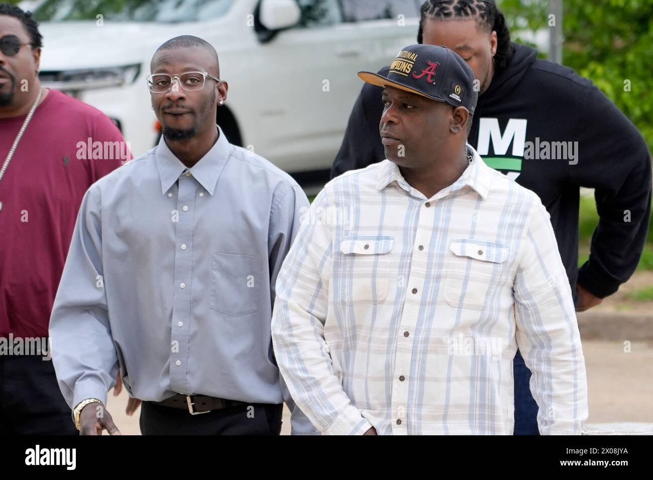FILE - Victims in a police abuse case, Michael Corey Jenkins, left, and ...