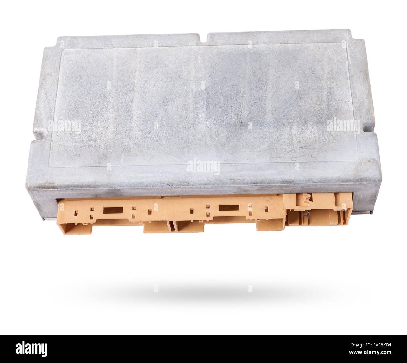 Plastic car engine control unit with metal elements on a white isolated ...