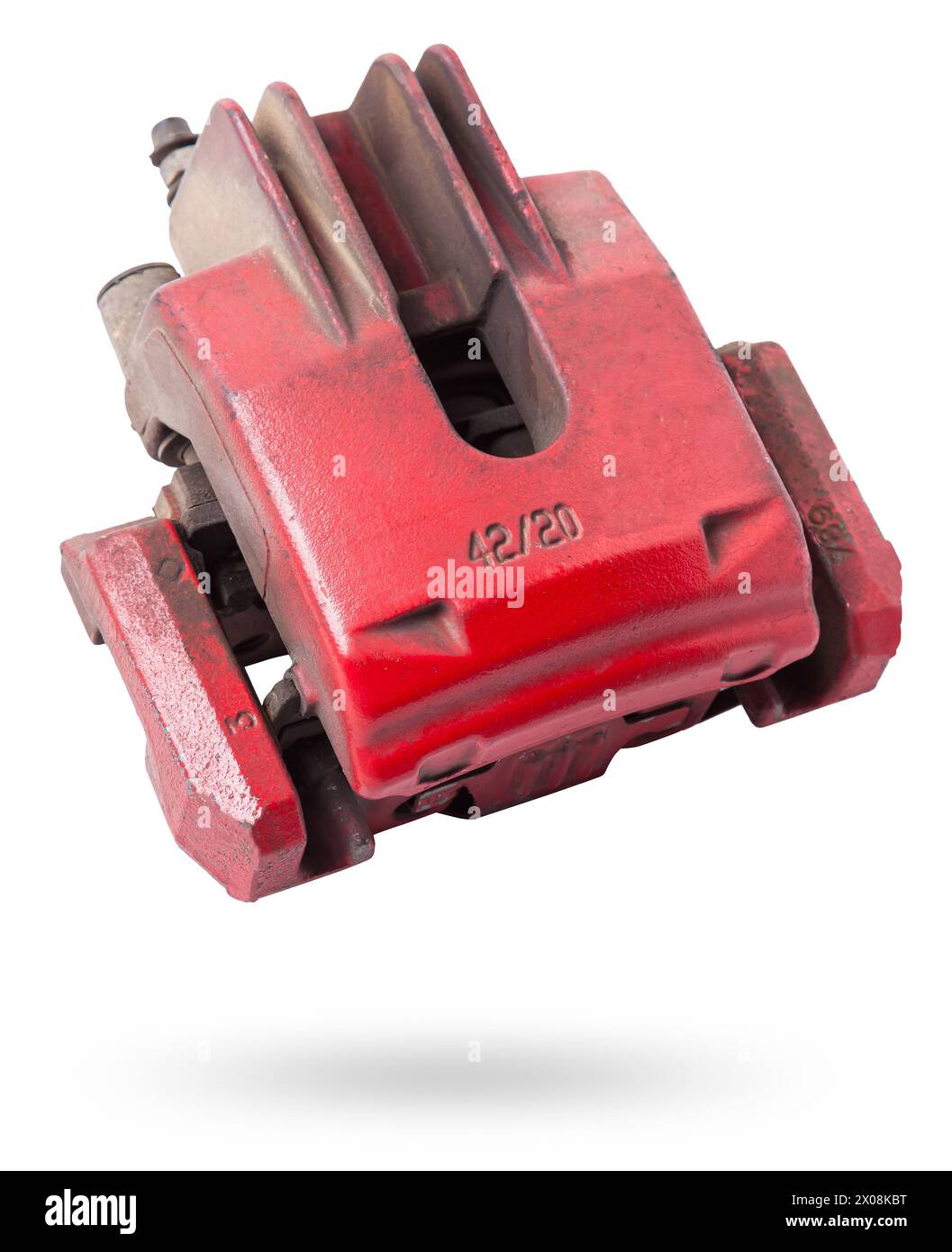 Old metal brake caliper on a white background for replacement during ...